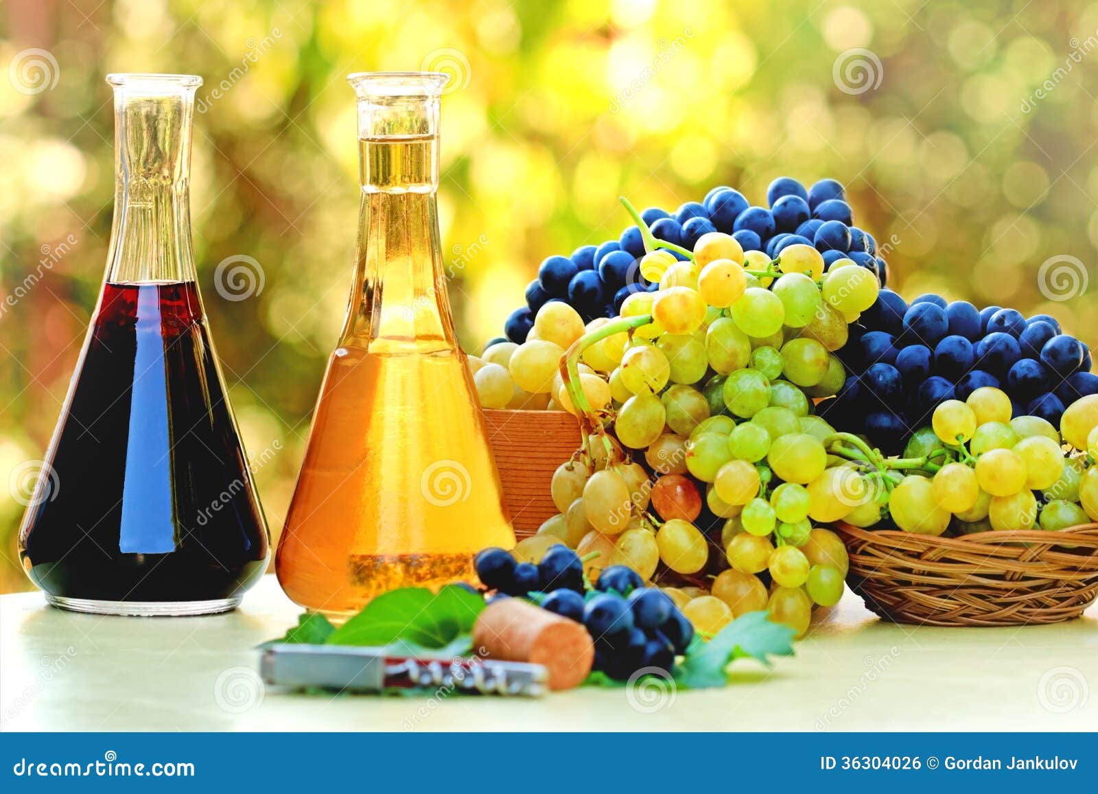 Wine and Grapes in the Bottles Stock Photo - Image of colorful ...