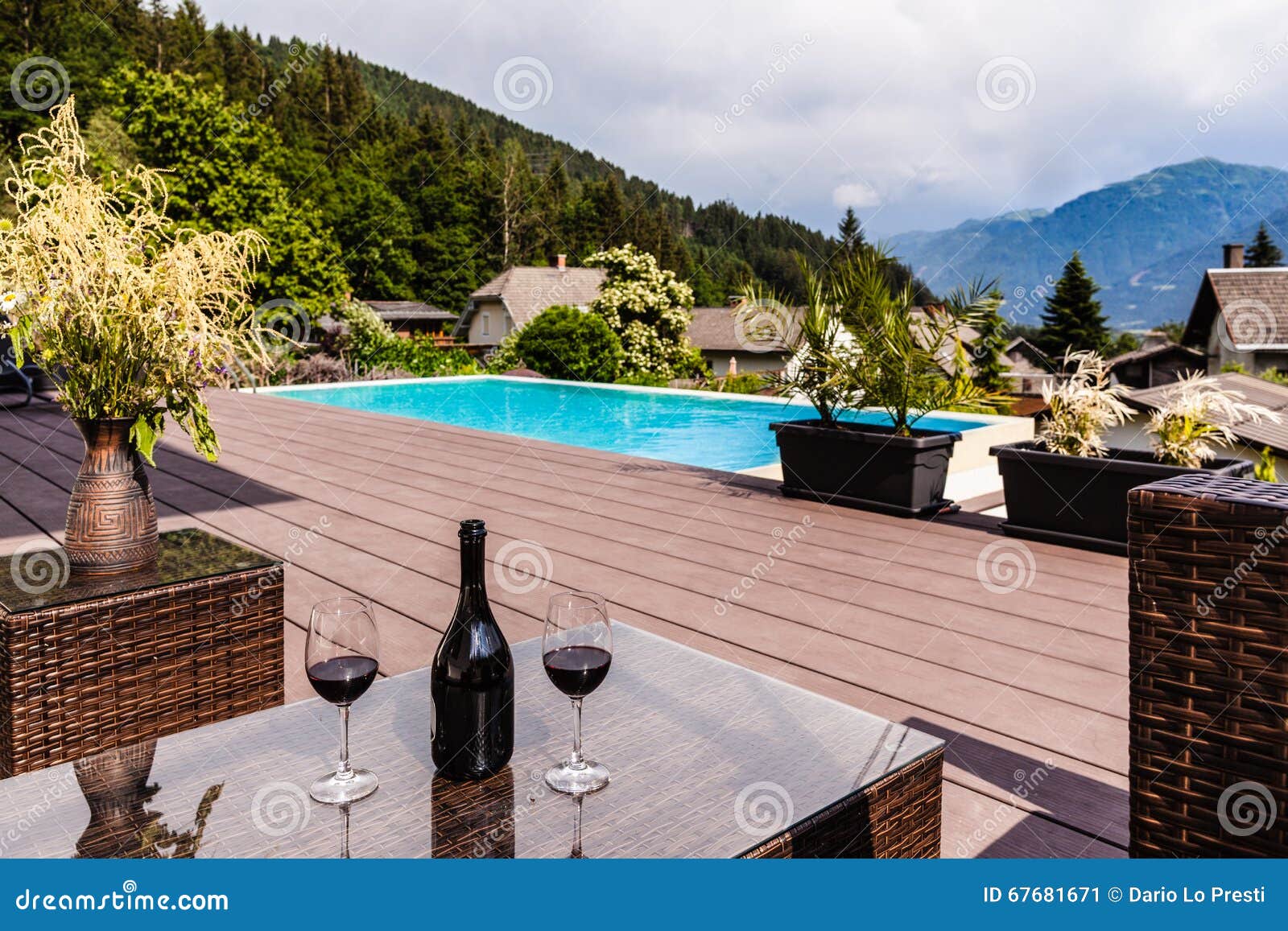 Wine by the pool stock image. Image of contemporary, bottle - 67681671
