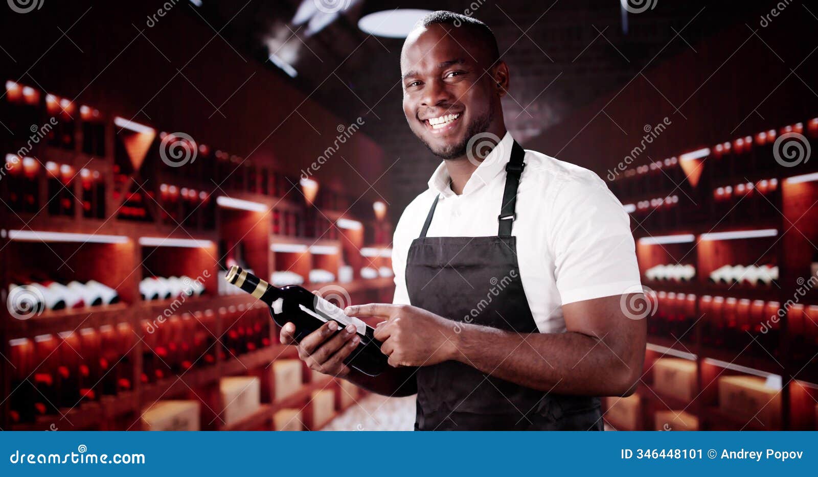 Wine Service Waiter Holding a Bottle Stock Image - Image of ...