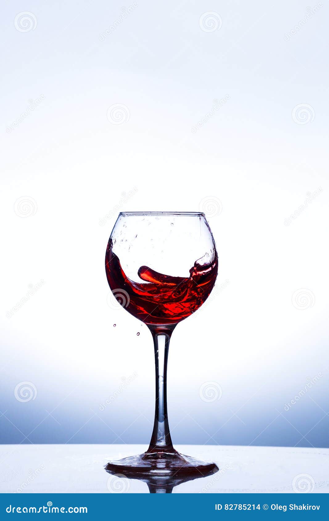 Wine splashing in glass stock photo. Image of shadow - 82785214