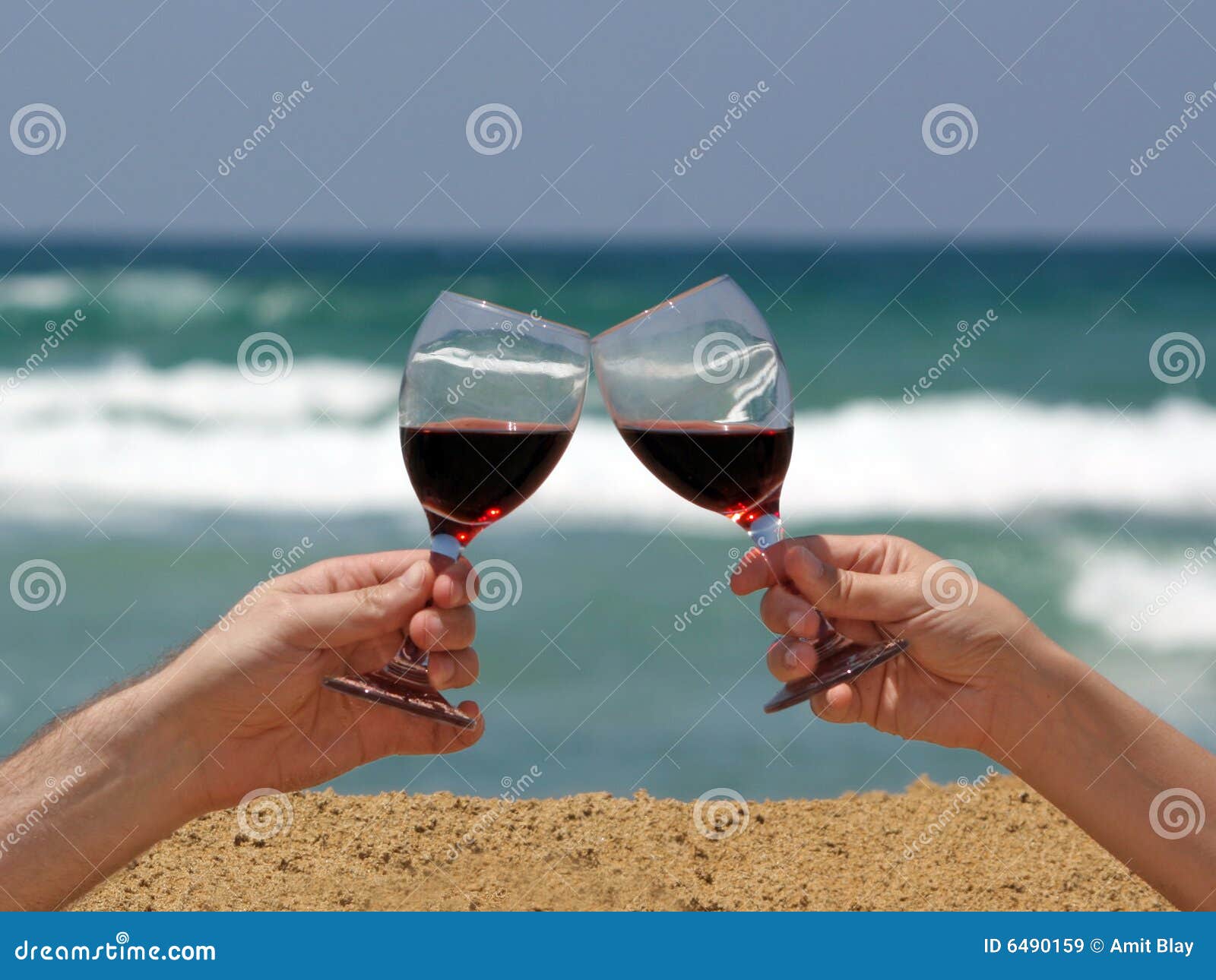 Wine toast on the beach stock image. Image of wine, celebration - 6490159