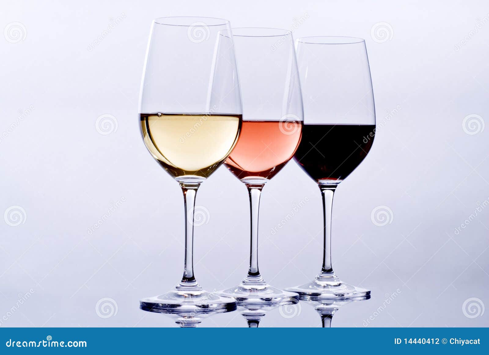 Wineglasses Filled with Colorful Wine Stock Photo - Image of ...