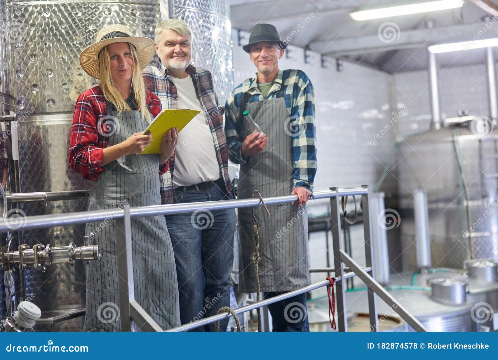 Winery Team with Cellar Master and Trainee Stock Photo - Image of ...