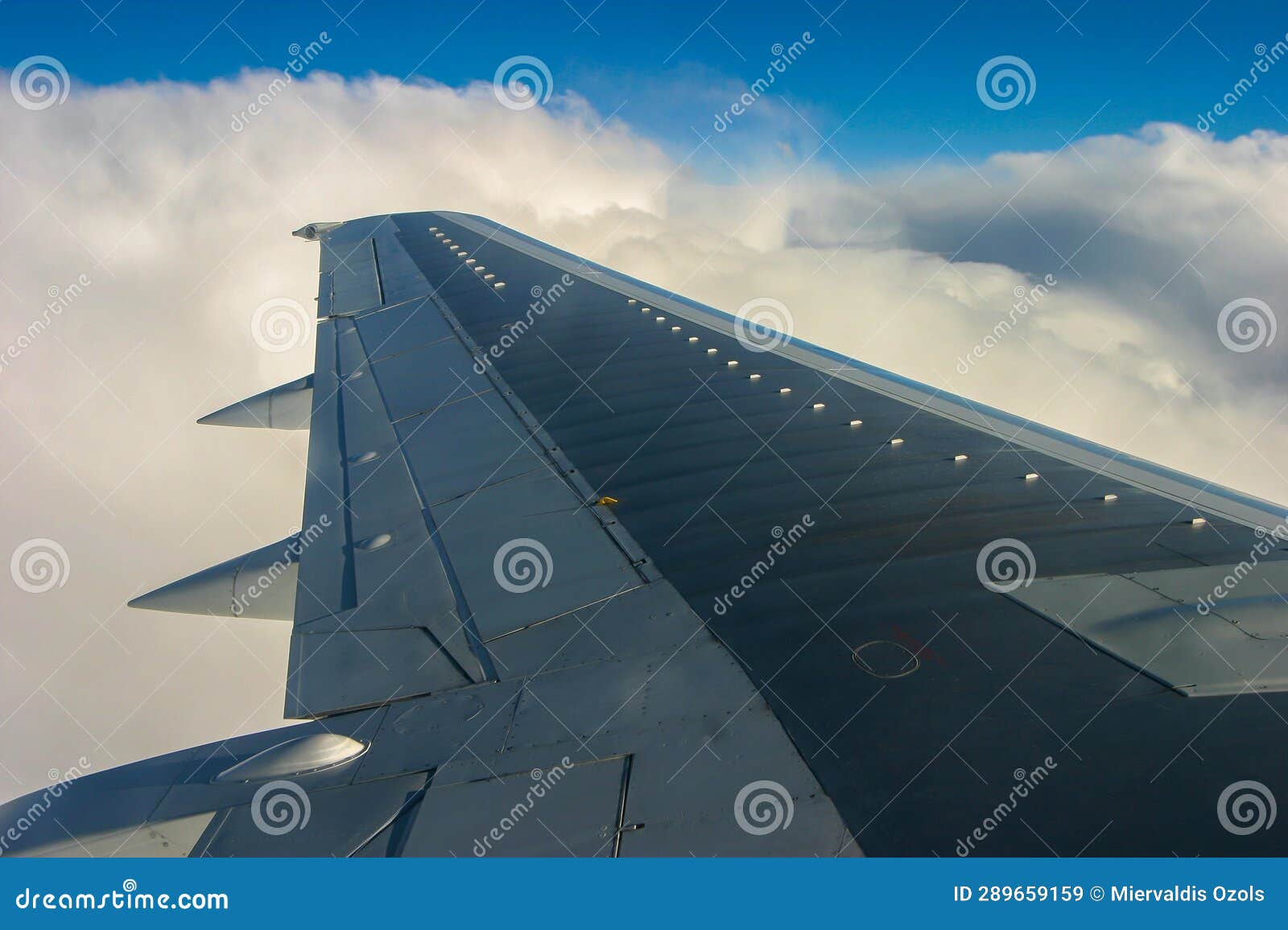 Wing above the clouds stock image. Image of cloud, architecture - 289659159
