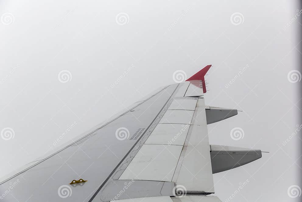 Wing of the Airbus 320 stock photo. Image of airplaine - 259763868