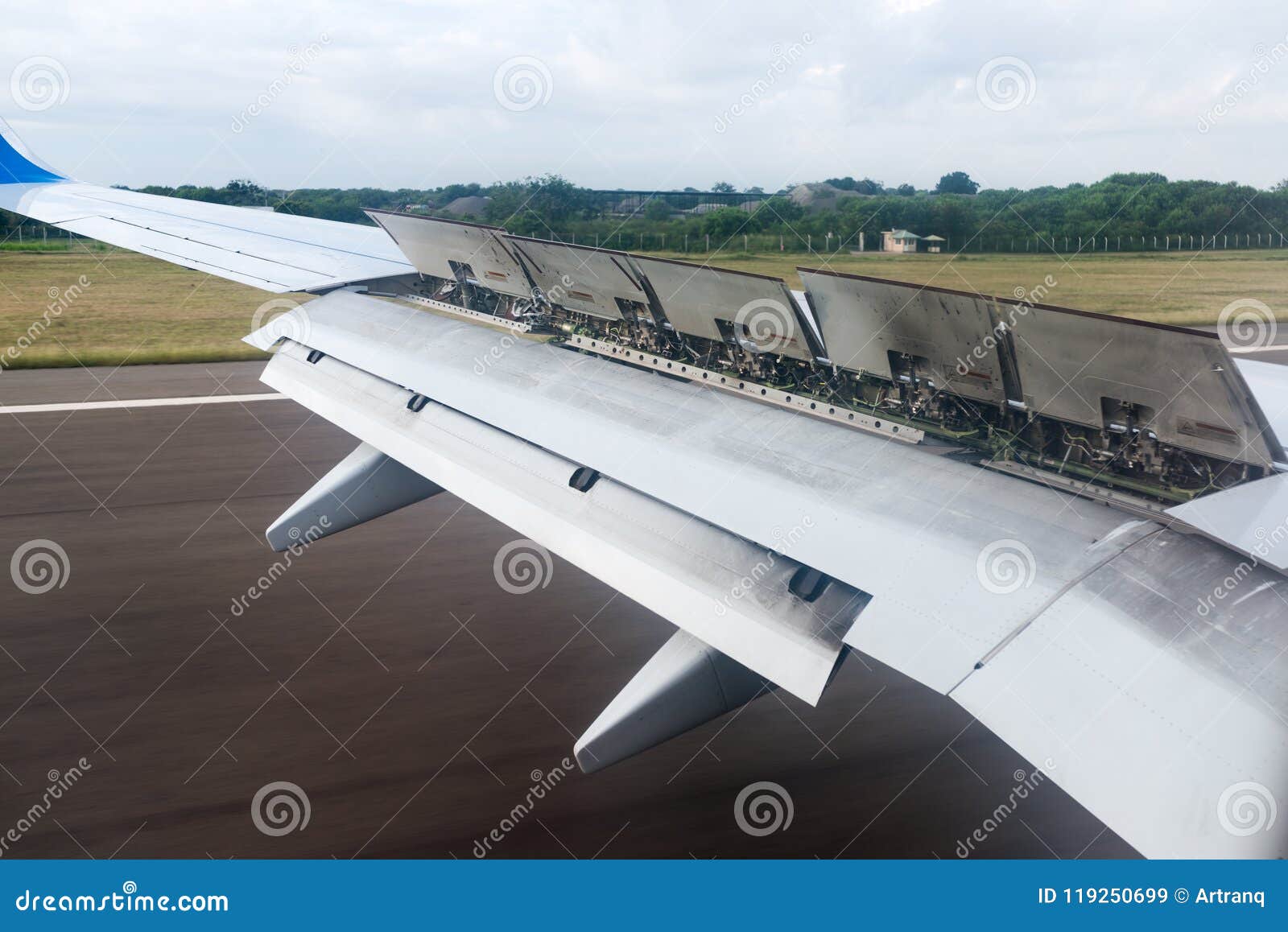 The Wing of the Aircraft with Flaps Open Stock Image - Image of landing ...