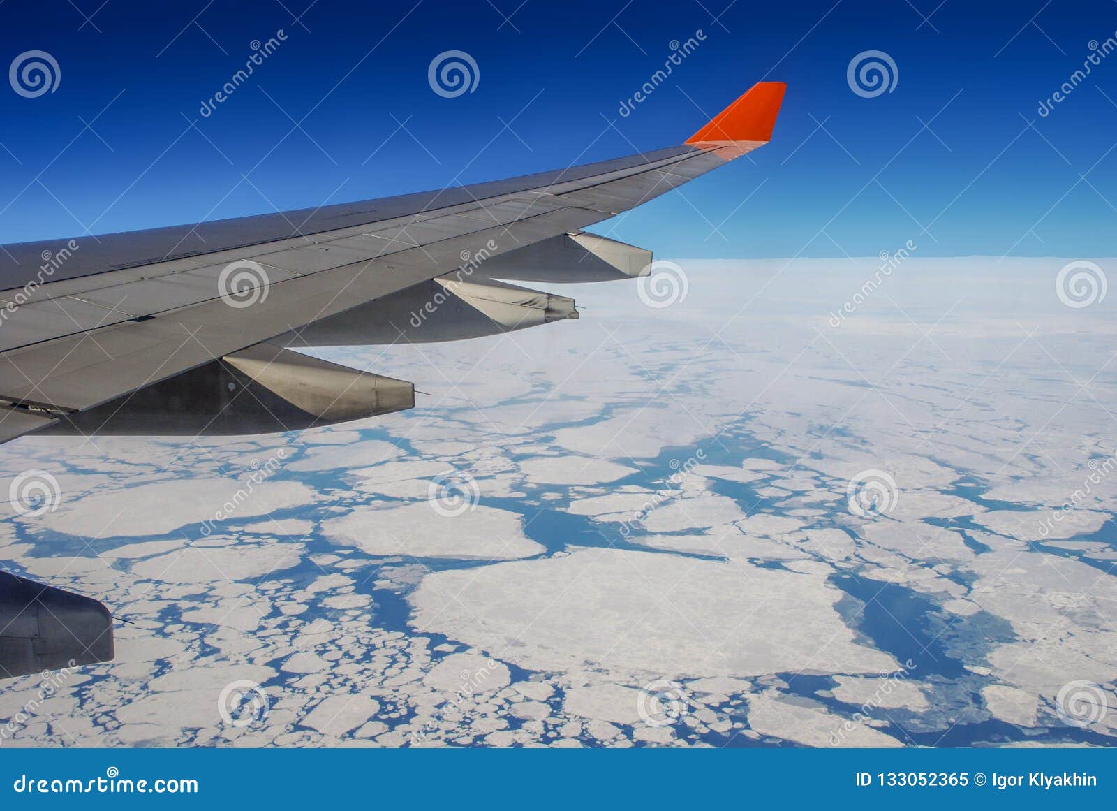 The Wing of the Aircraft Over the Arctic Ocean Stock Image - Image of ...