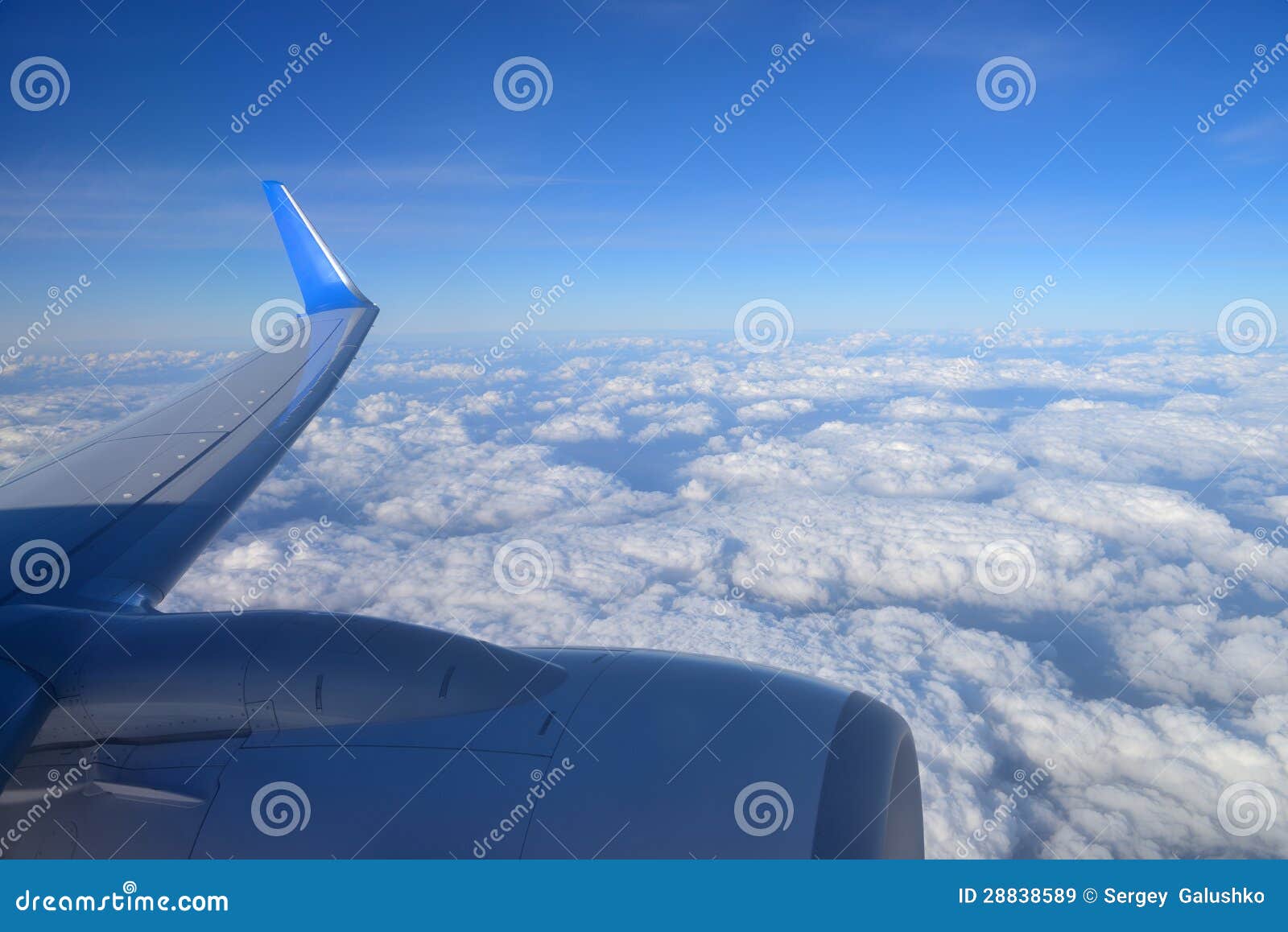 Wing aircraft over clouds stock image. Image of overcast - 28838589