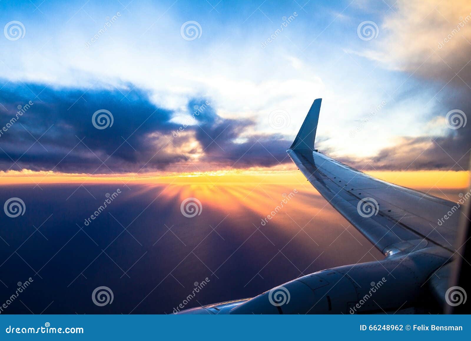 Wing aircraft at sunset. stock photo. Image of blue, atmosphere - 66248962