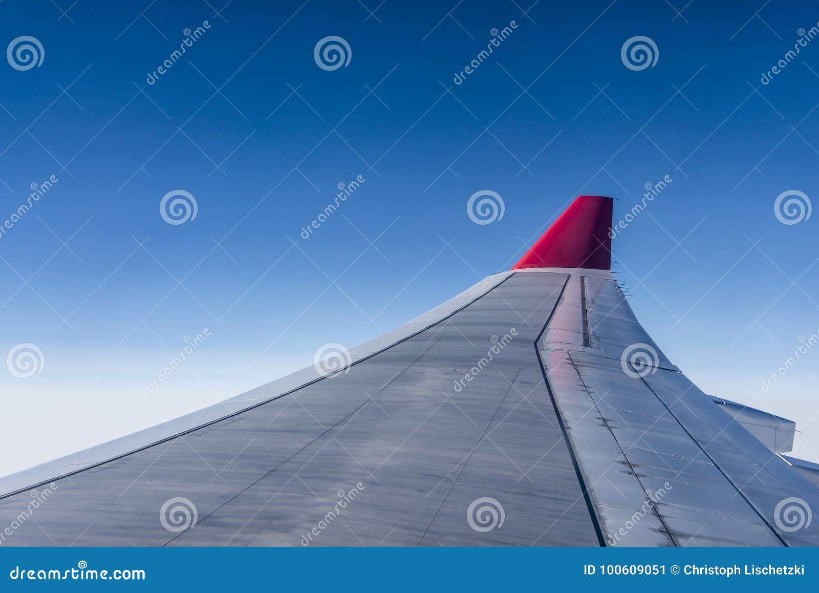 Wing of Airplane from Air in the Sky Winglet Red Colored Airline Blue ...