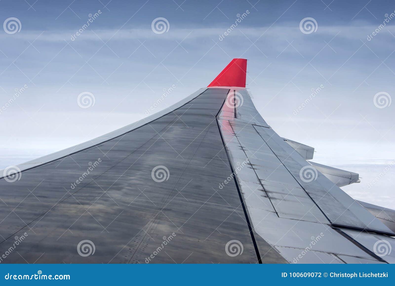 Wing of Airplane from Air in the Sky Winglet Red Colored Airline Blue ...