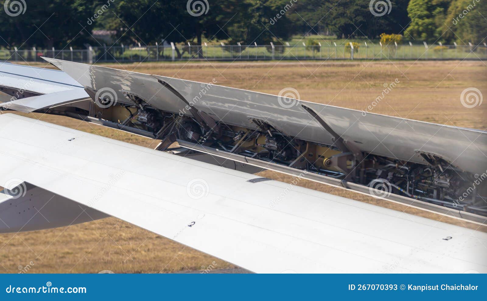 Wing Braking of the Aircraft on the Runway. the Wing of an Aircraft ...