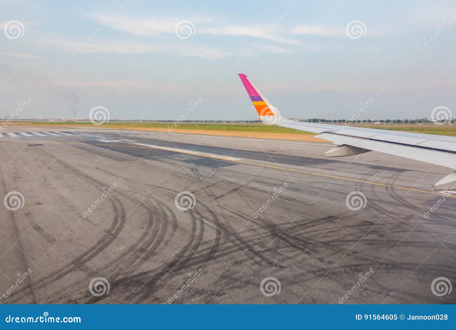 Wing while Breaking during Landing on Runway . Stock Image - Image of ...