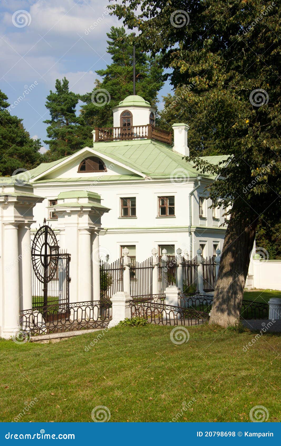 Wing mansion with a gate stock photo. Image of park, building - 20798698
