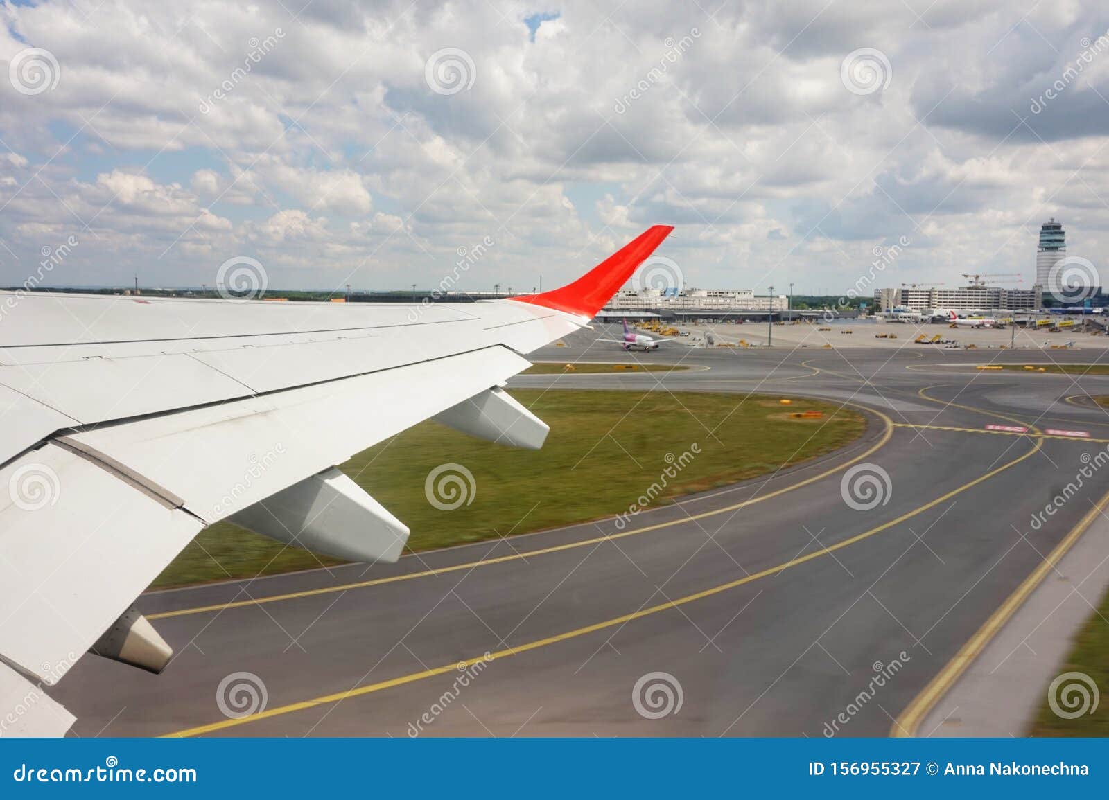 The Wing of a Take-off Airplane. Below is the Airport. Stock Image ...