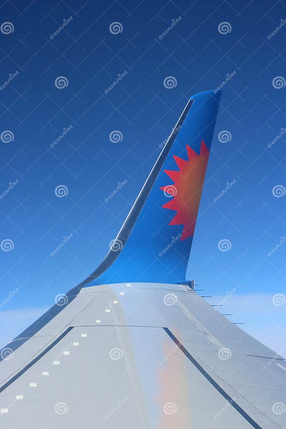 Wing Tip Boeing 757 in Flight Against Blue Sky Editorial Photo - Image ...