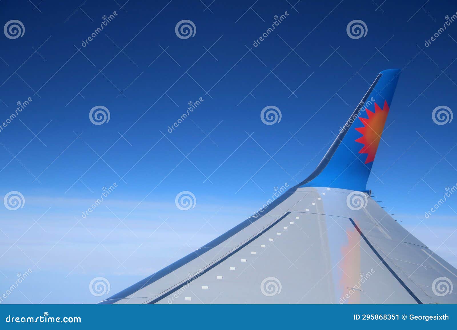 Wing Tip Boeing 757 in Flight Against Blue Sky Editorial Photo - Image ...