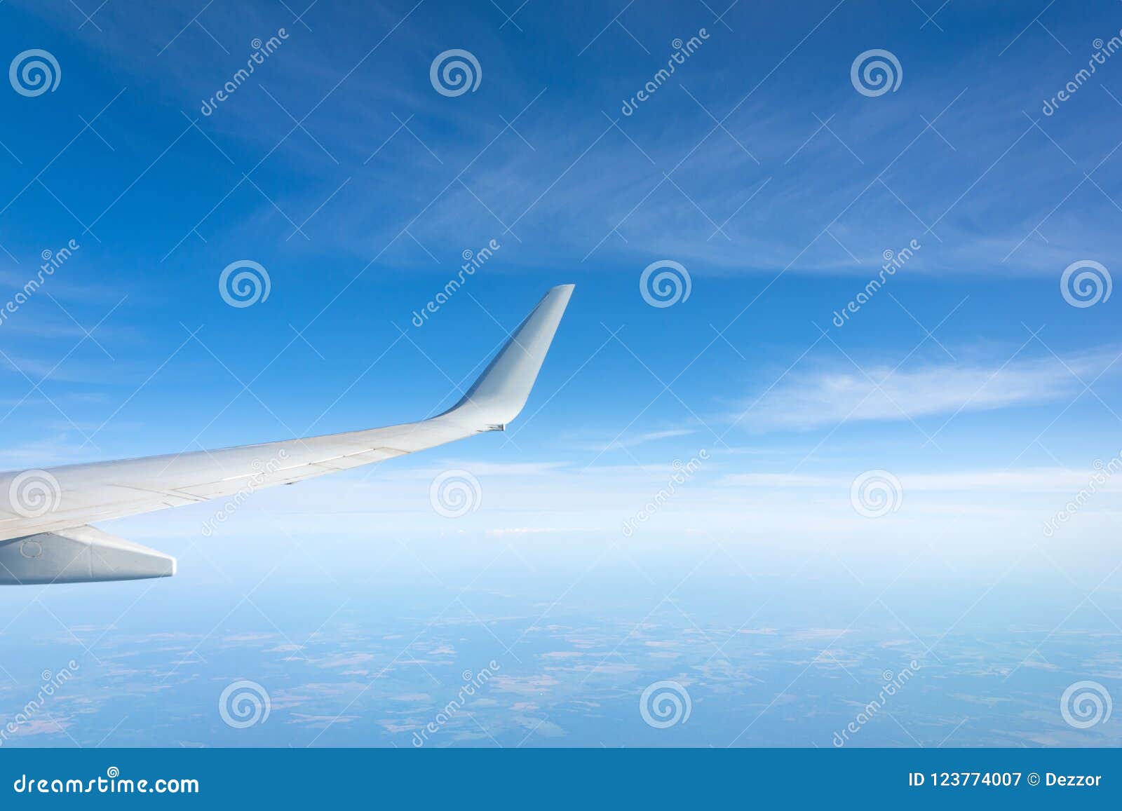 Wing View of the Airplane on a Winglets, Clouds on the Skyline during ...