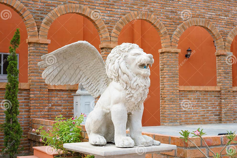 Winged Lion Statue Spitting Water Stock Photo - Image of predator ...