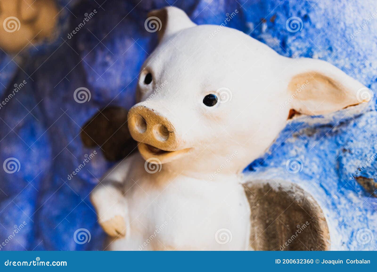 Winged Pig Made of Clay and Painted on a Blue Sky Background Wall Stock ...
