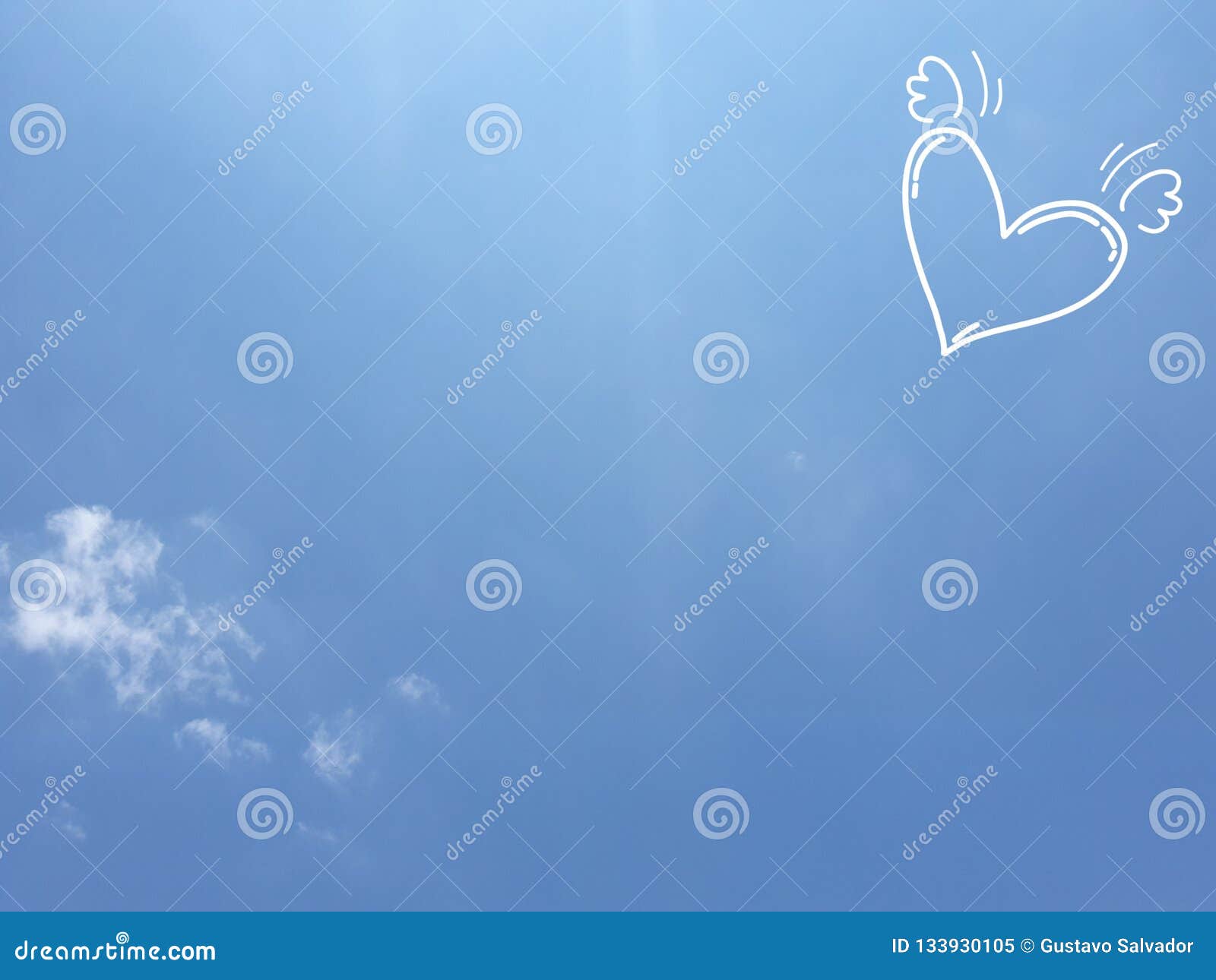 A Winged White Heart in White Color Over a Blue Sky Background Stock ...