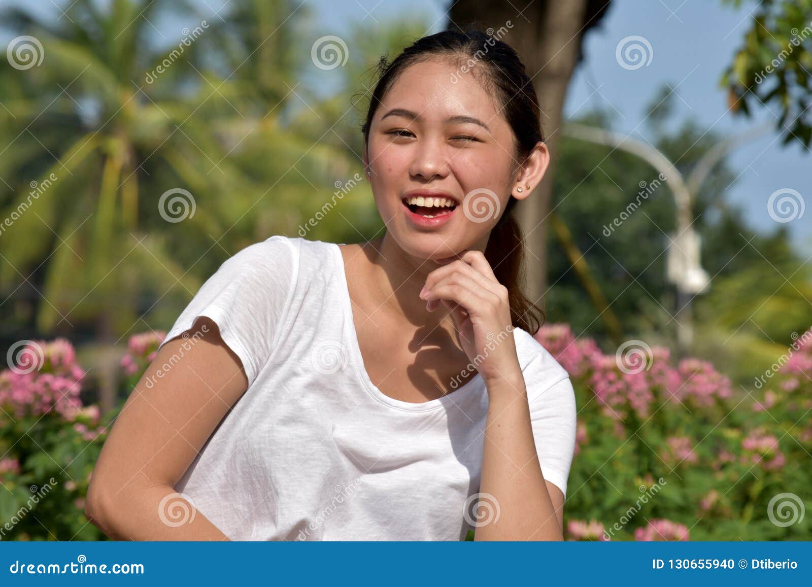 Winking Beautiful Female stock photo. Image of wink - 130655940