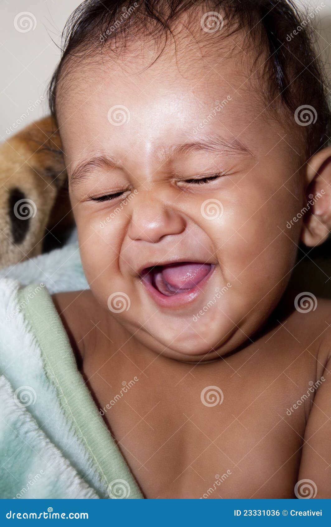 Winking Infant stock photo. Image of innocent, belly - 23331036