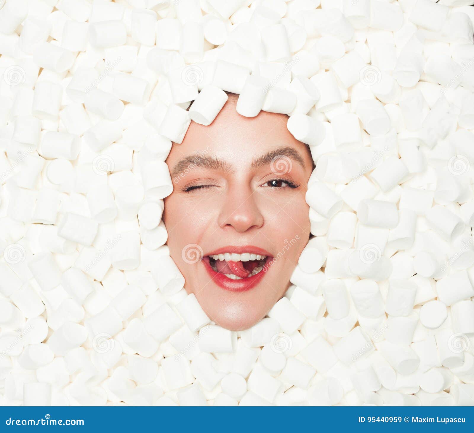 Winking Model Posing in Mashmallow Stock Image - Image of wink ...