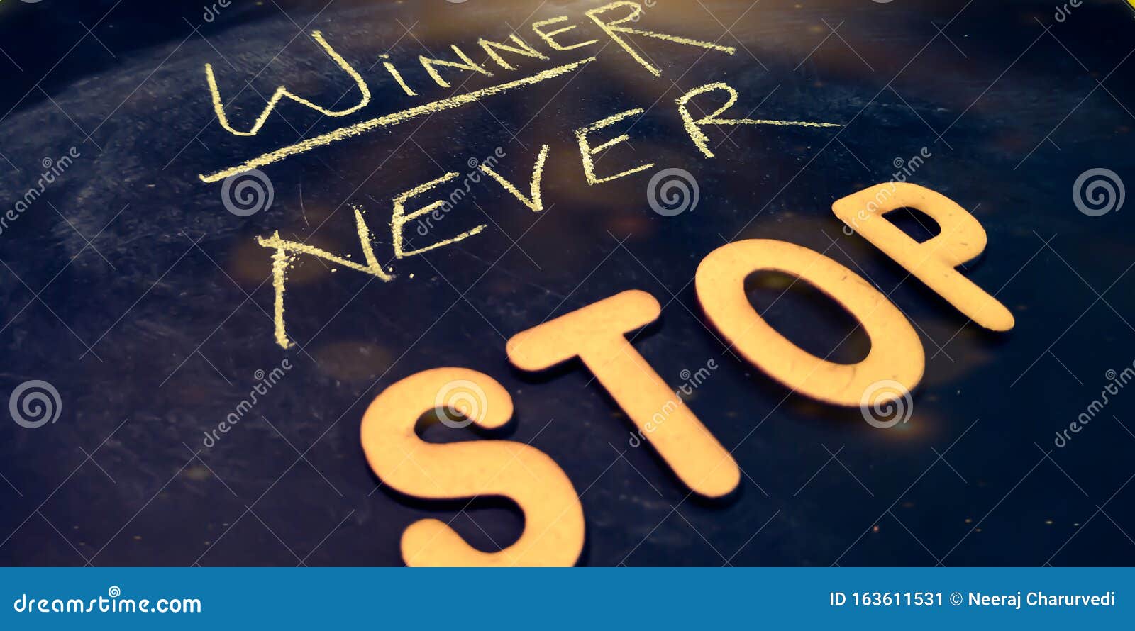 Winner Never Stop Thinking Concept Displaying with Using Chalk Board ...