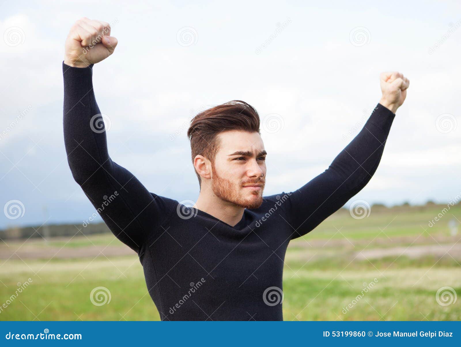 Winner Strong Man in the Meadow Stock Photo - Image of emotion, raised ...