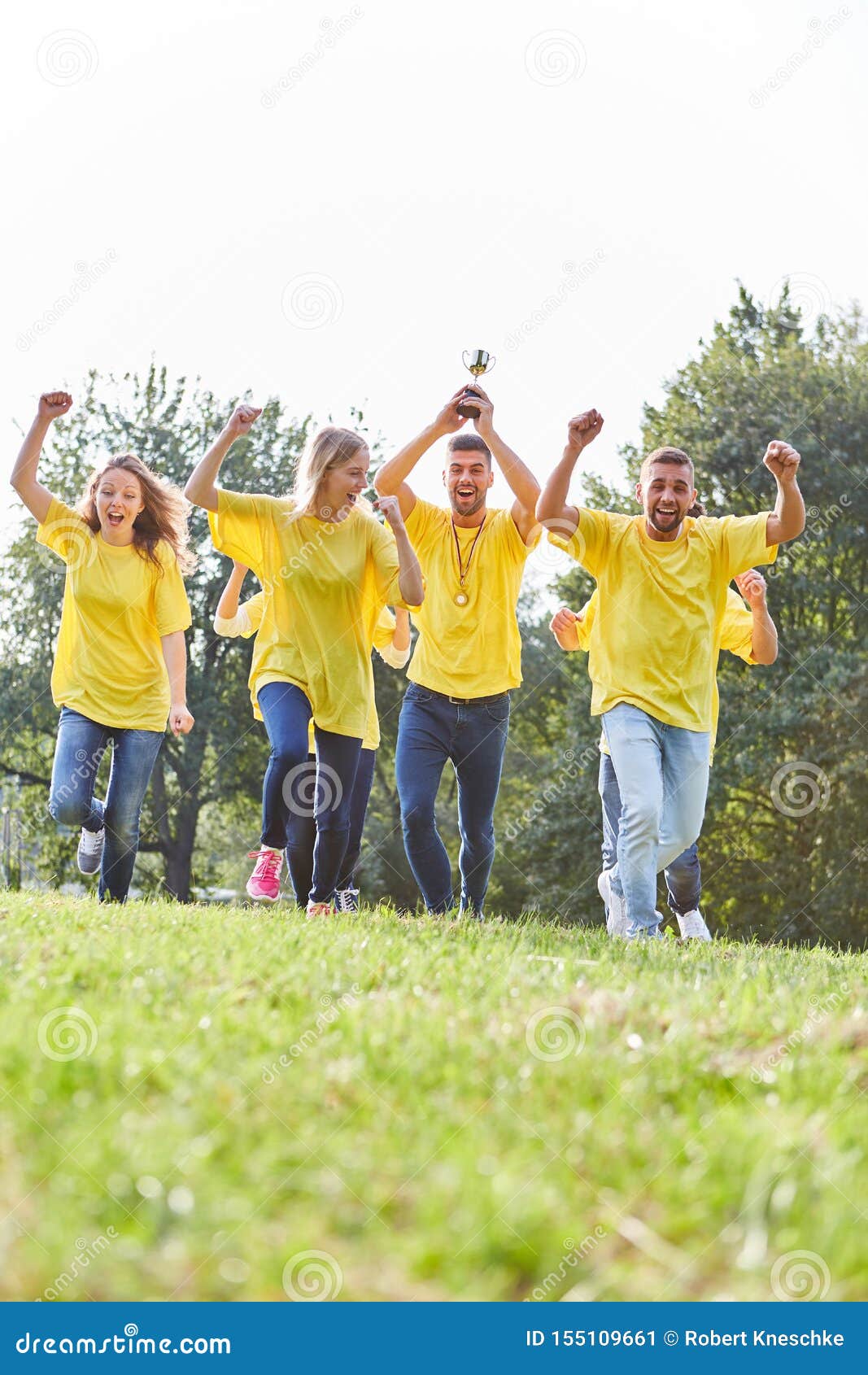 Winning Team is Cheering with the Trophy Stock Image - Image of ...