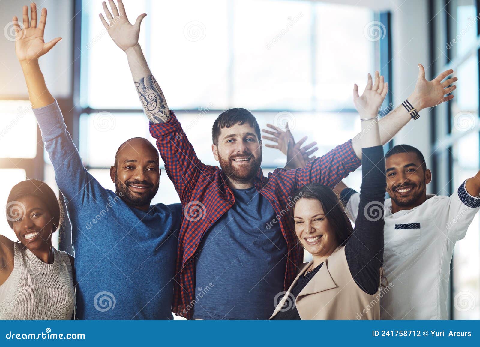 Winning is What we Do. Portrait of a Group of Young Colleagues Cheering ...