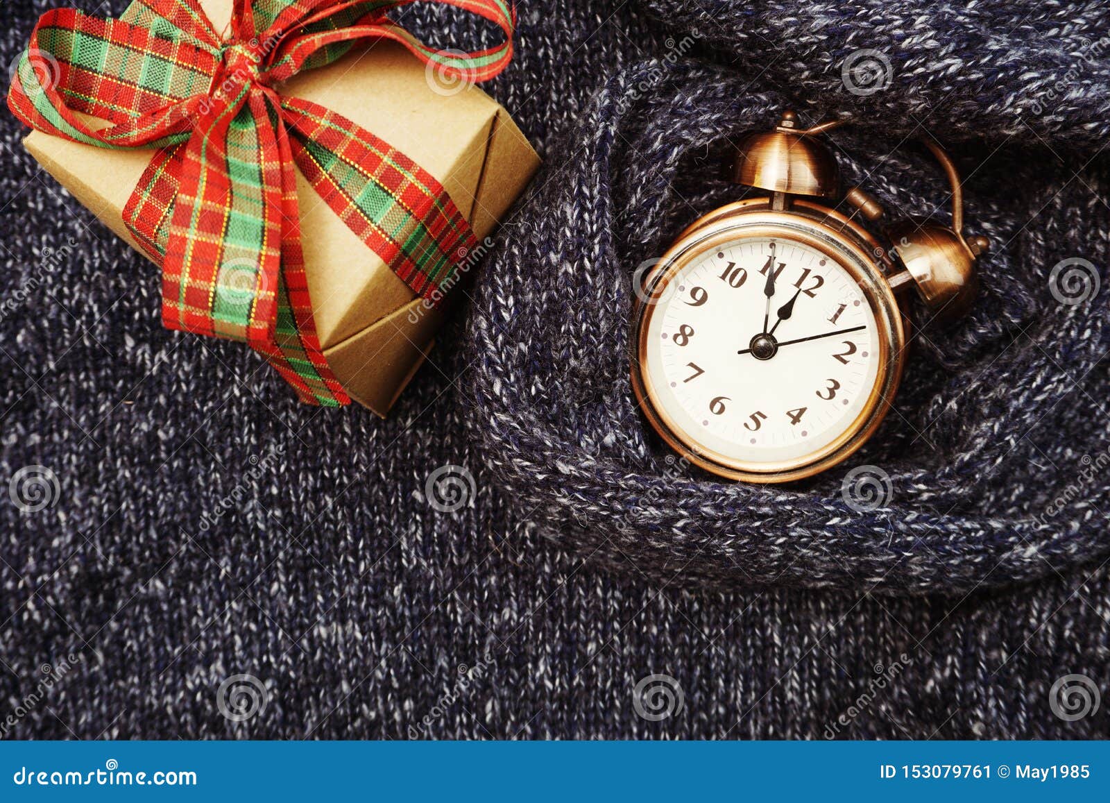 Winter Background with Alarm Clock and Gift Box on Blue Knitted Cloth ...