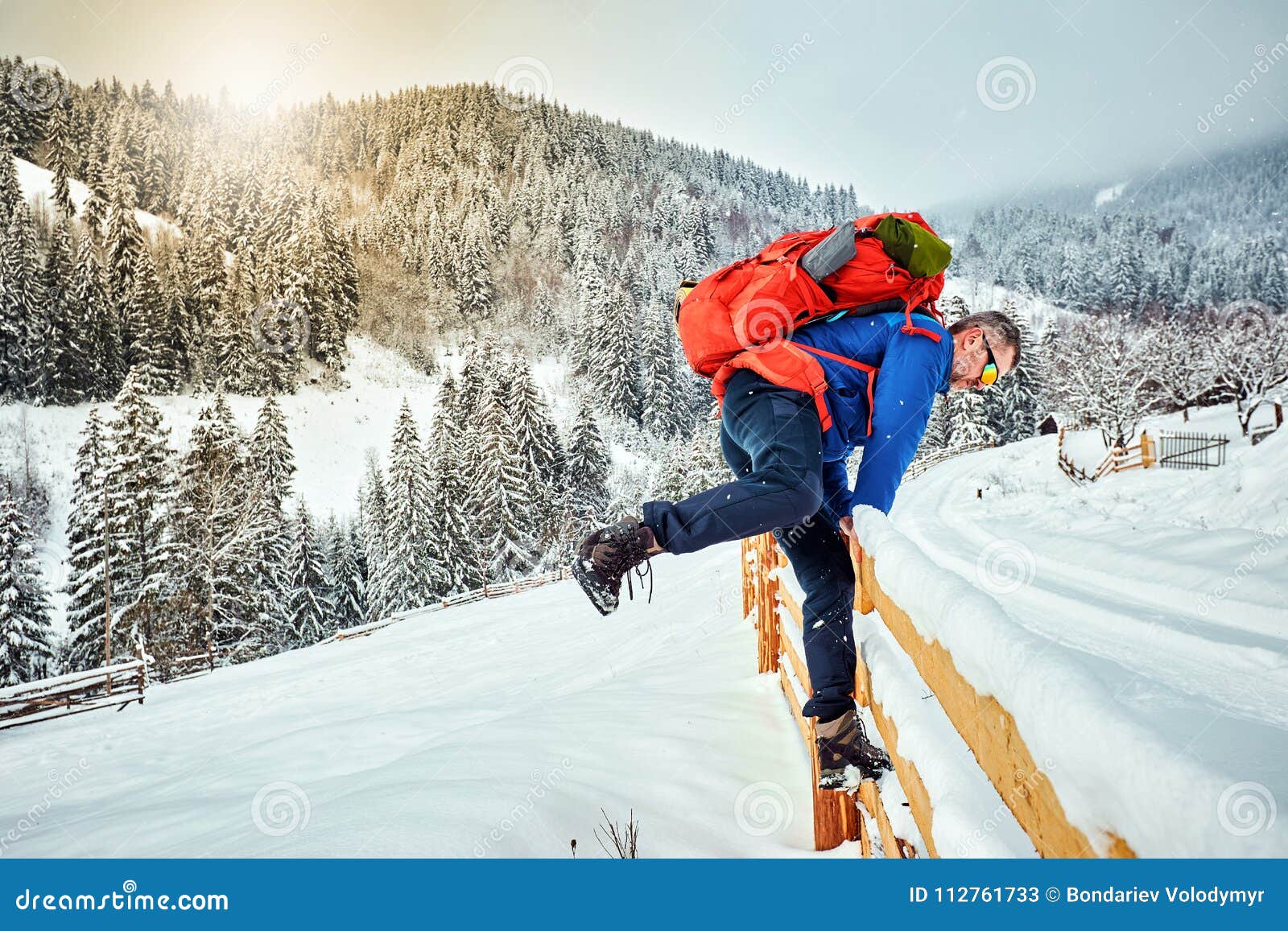 Winter Climb To the Top of the Mountain with a Backpack. Stock Image ...