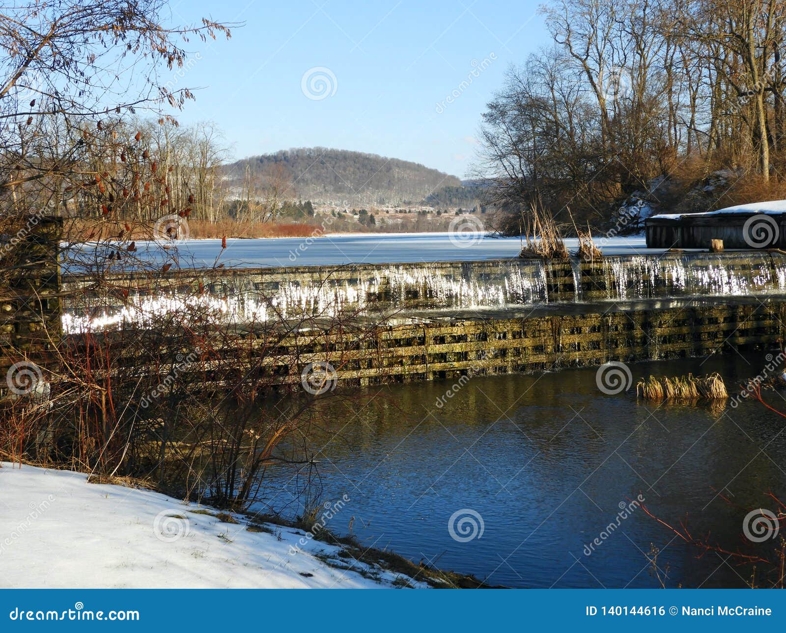 Winter Overlooking Dam on Dryden Lake Stock Photo - Image of canoe ...