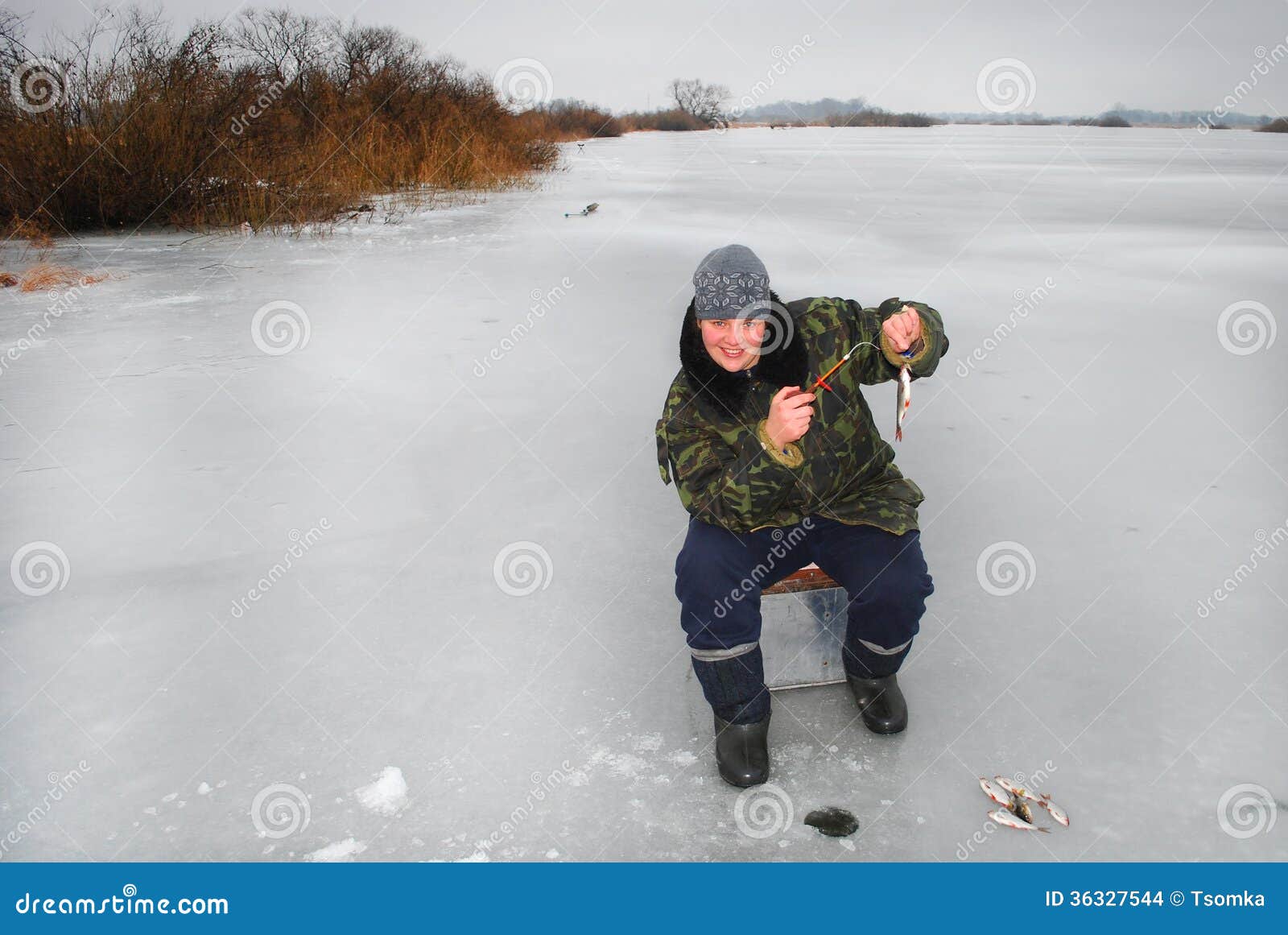 Winter Fisherman on the River Catching Fish Stock Photo - Image of ...
