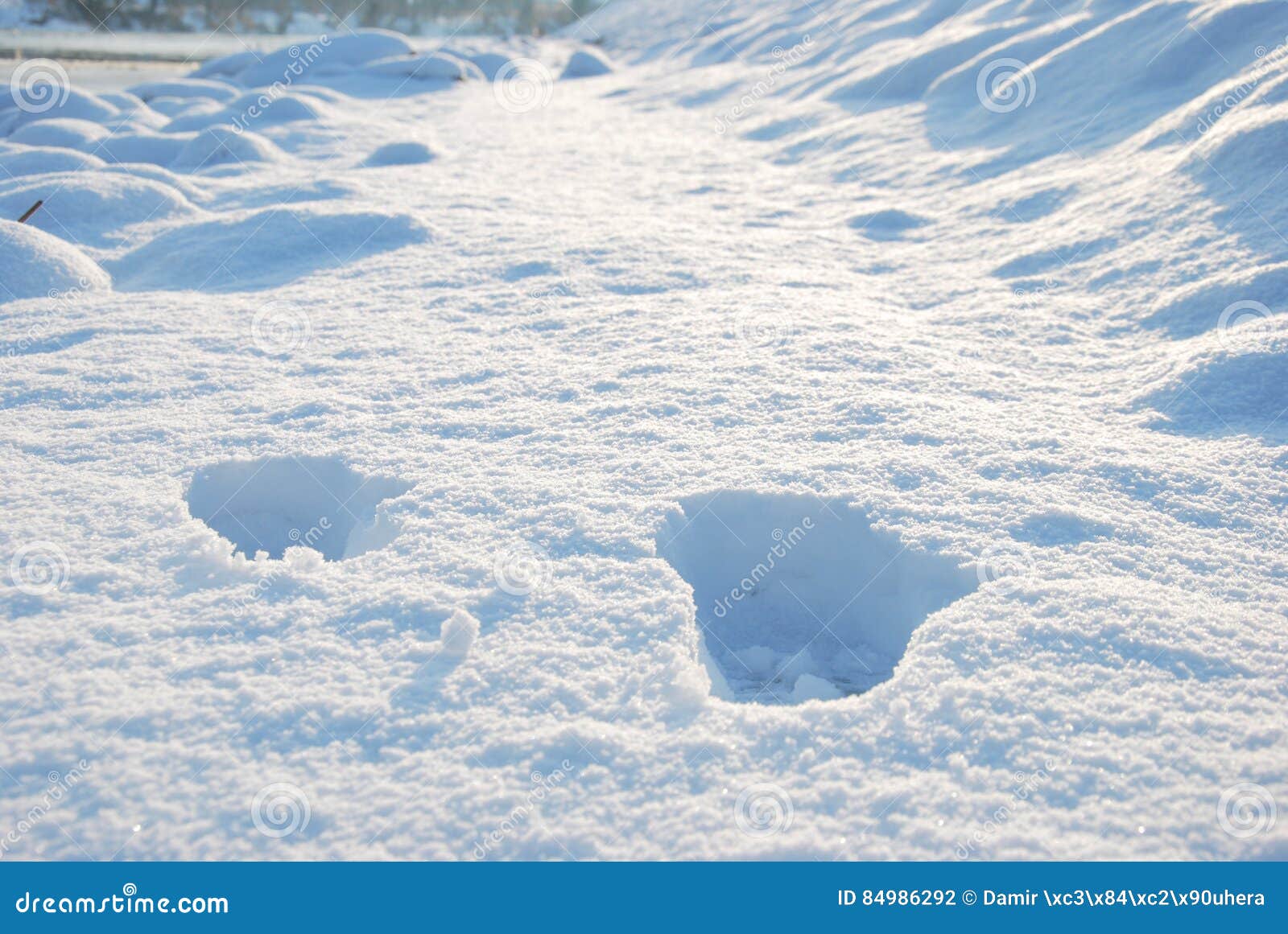 WINTER: Footstep in the Snow on the Road Stock Photo - Image of city ...