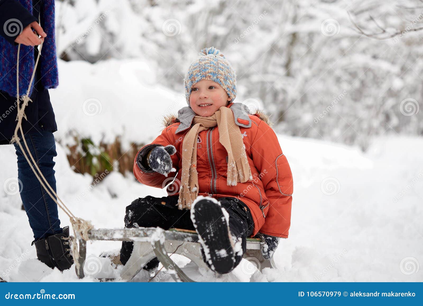 Winter Fun. the Boy is Riding a Sled. Stock Image - Image of people ...