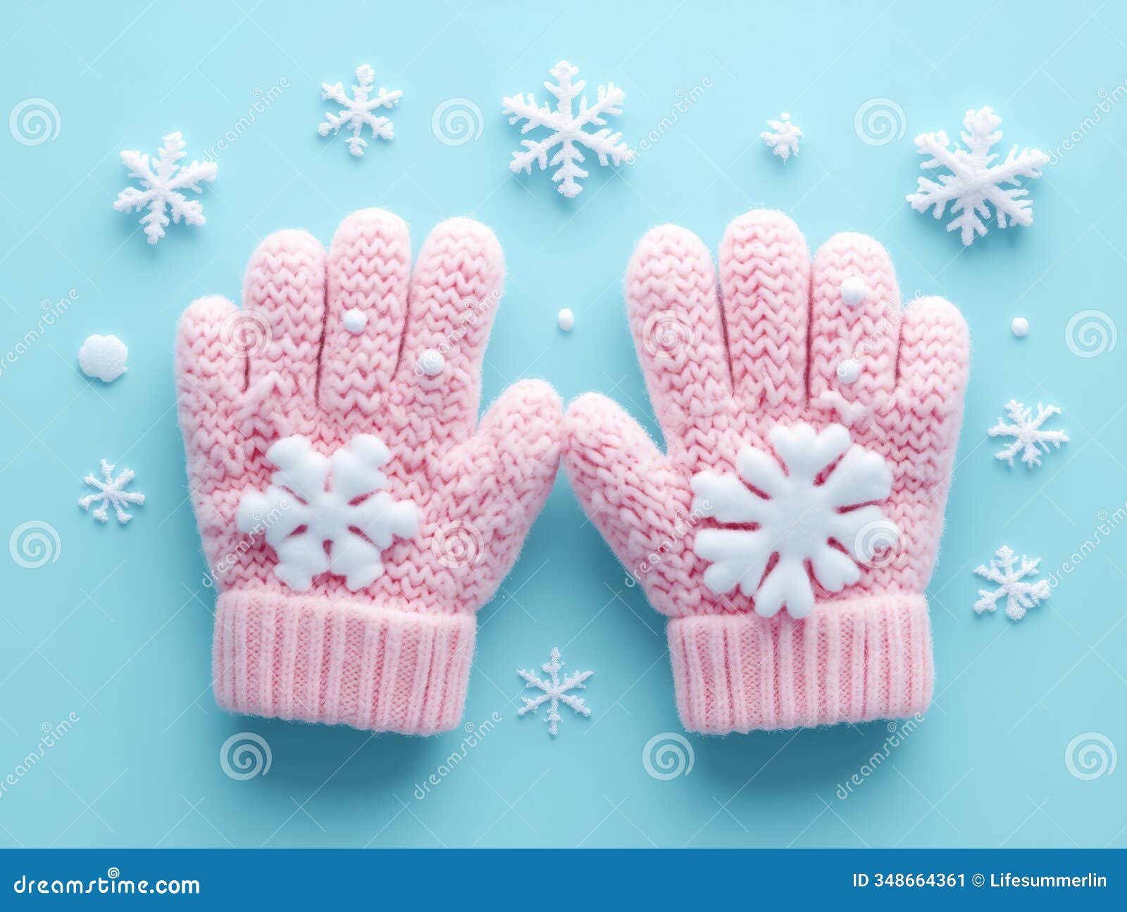 Winter Gloves Overlayed on Plain Blue Background with Falling ...