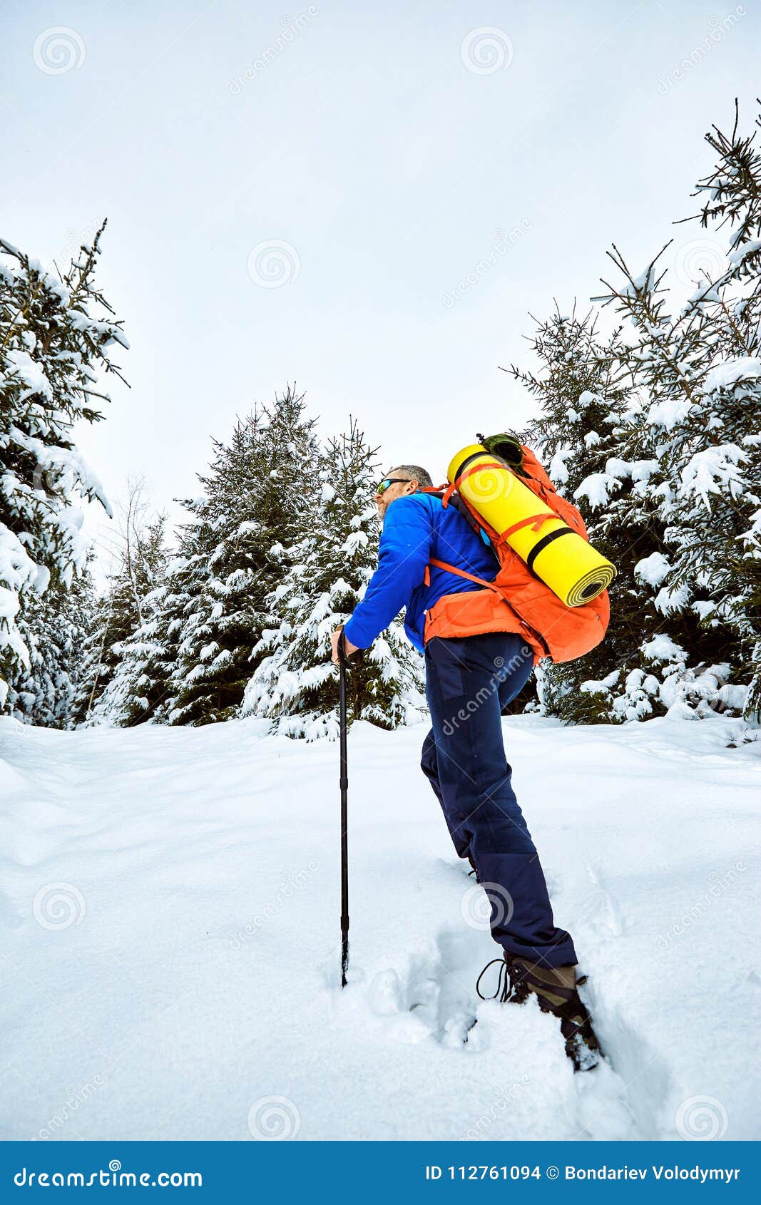 Winter Climb To the Top of the Mountain with a Backpack. Stock Photo ...
