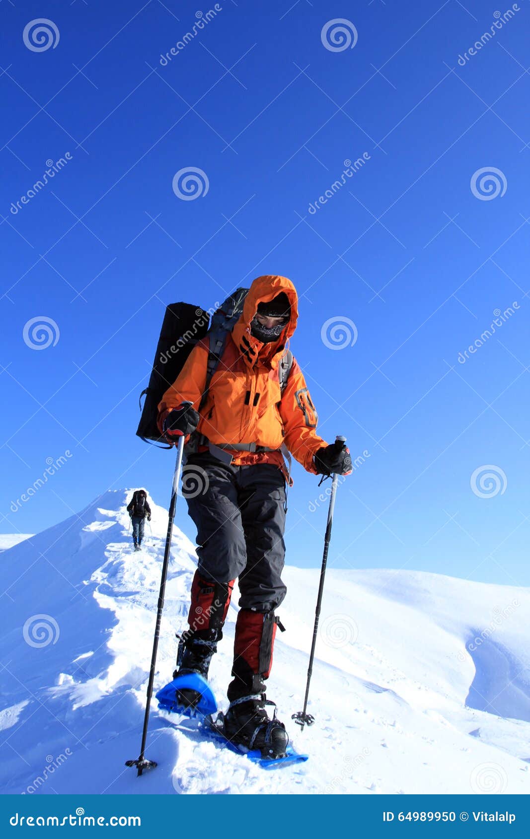 Winter Hiking in the Mountains on Snowshoes with a Backpack and Tent ...