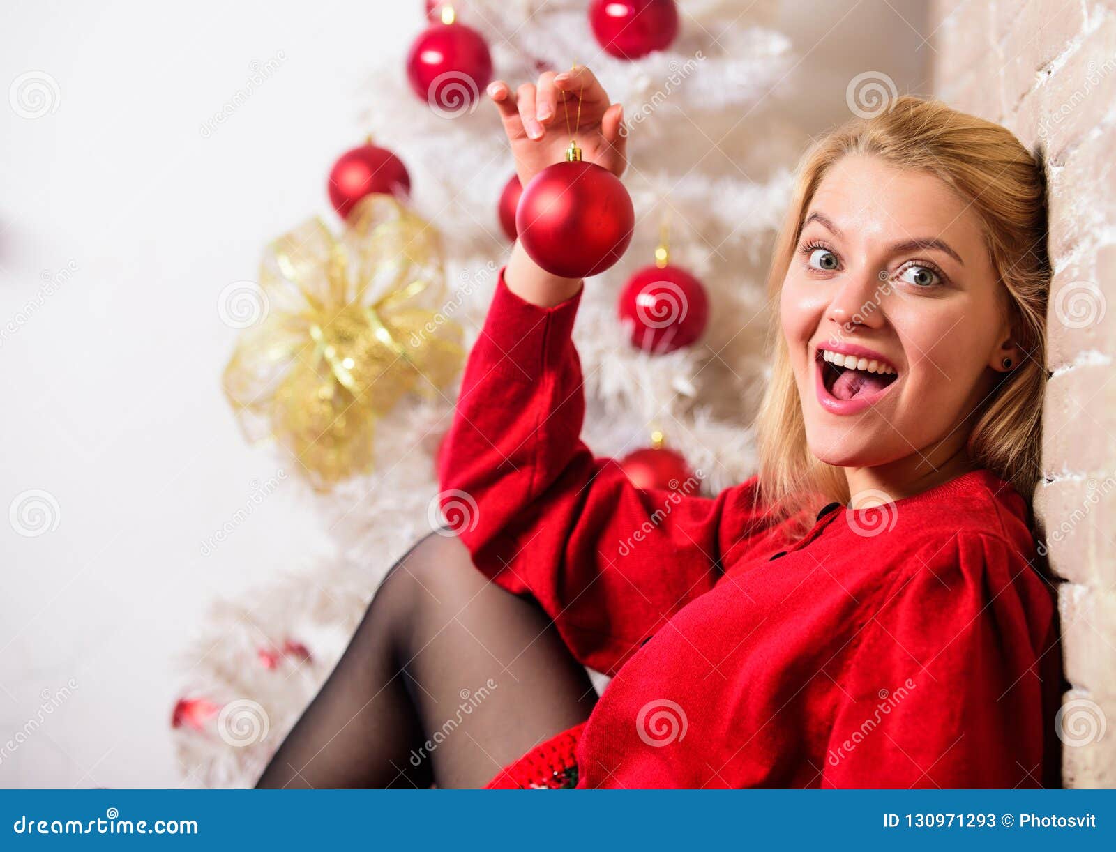 Winter Holidays Concept Girl Decorate Christmas Tree With Ornaments