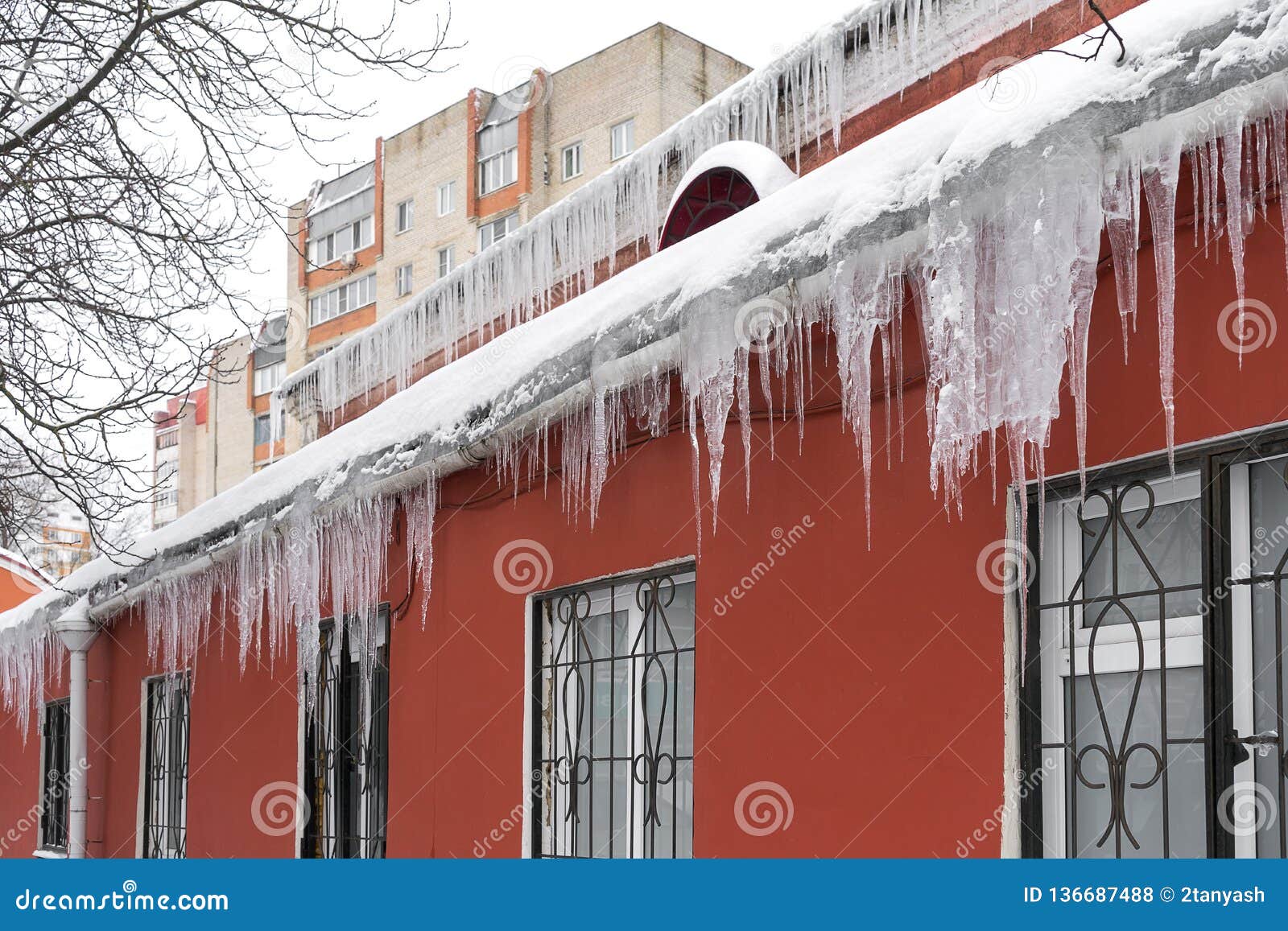 Winter Icicles Hanging from Eaves of Roofs Stock Photo - Image of edge ...