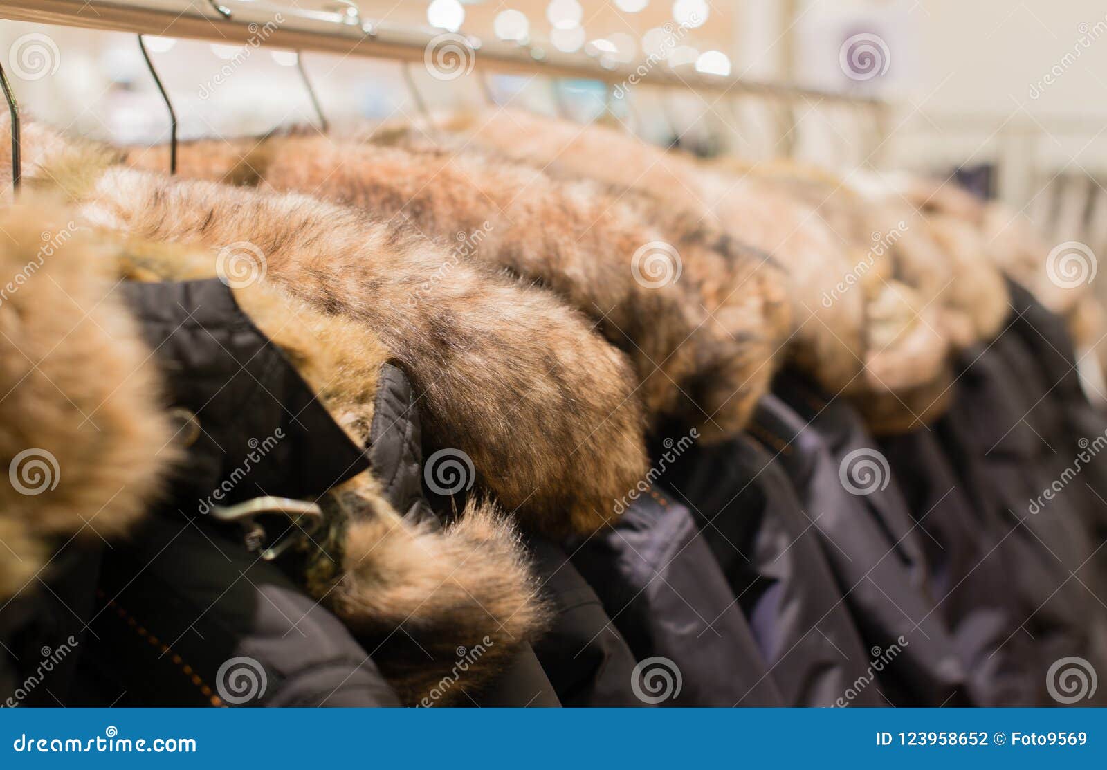 Winter Jacket in Winter Sale on a Clothes Rack Stock Photo - Image of ...