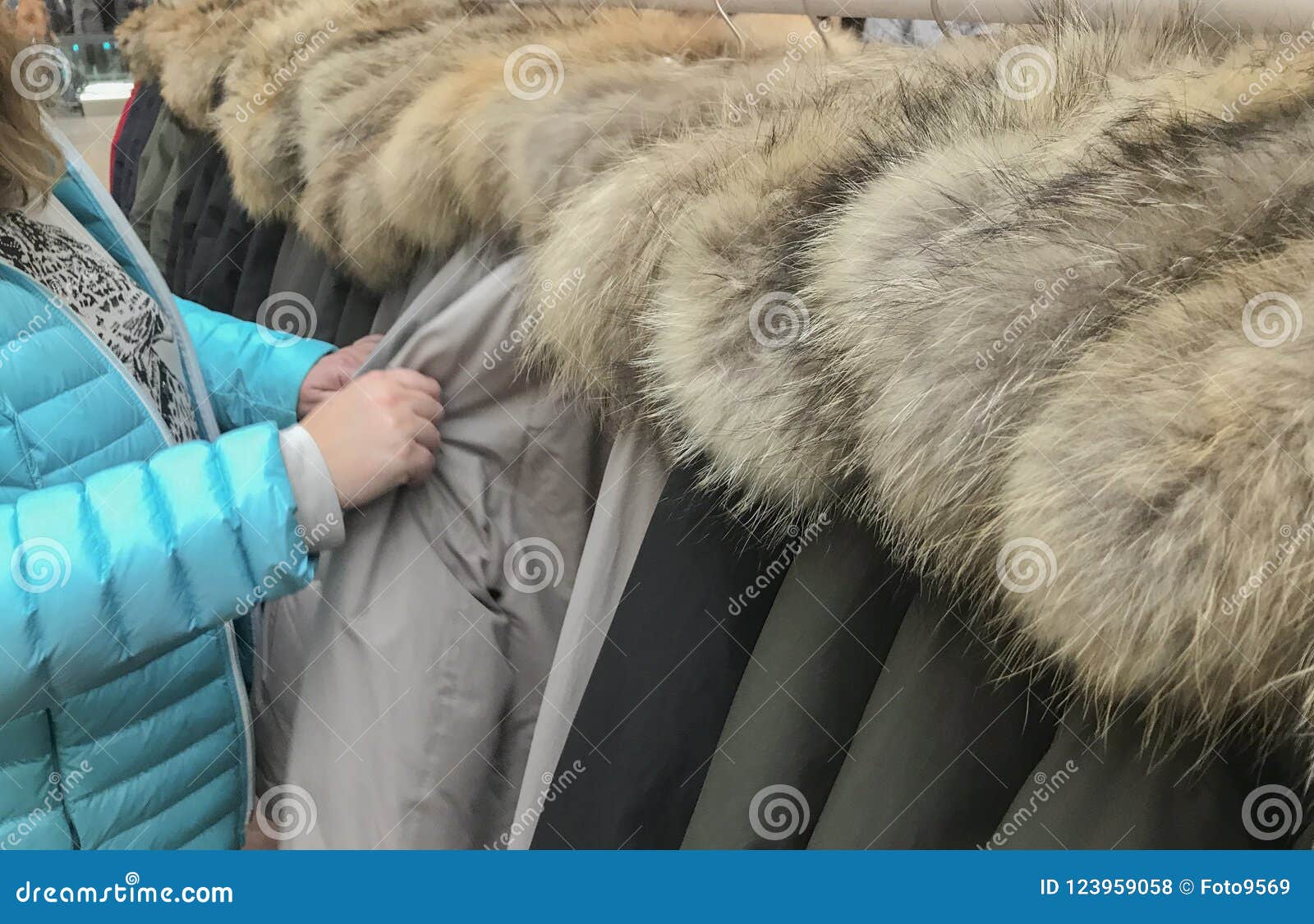 Winter Jacket in Winter Sale on a Clothes Rack Stock Photo - Image of ...