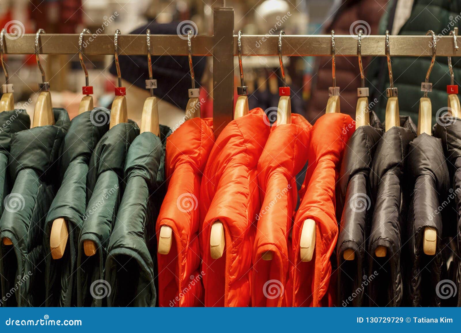 Winter Jackets on a Hanger in the Store Close-up Stock Image - Image of ...