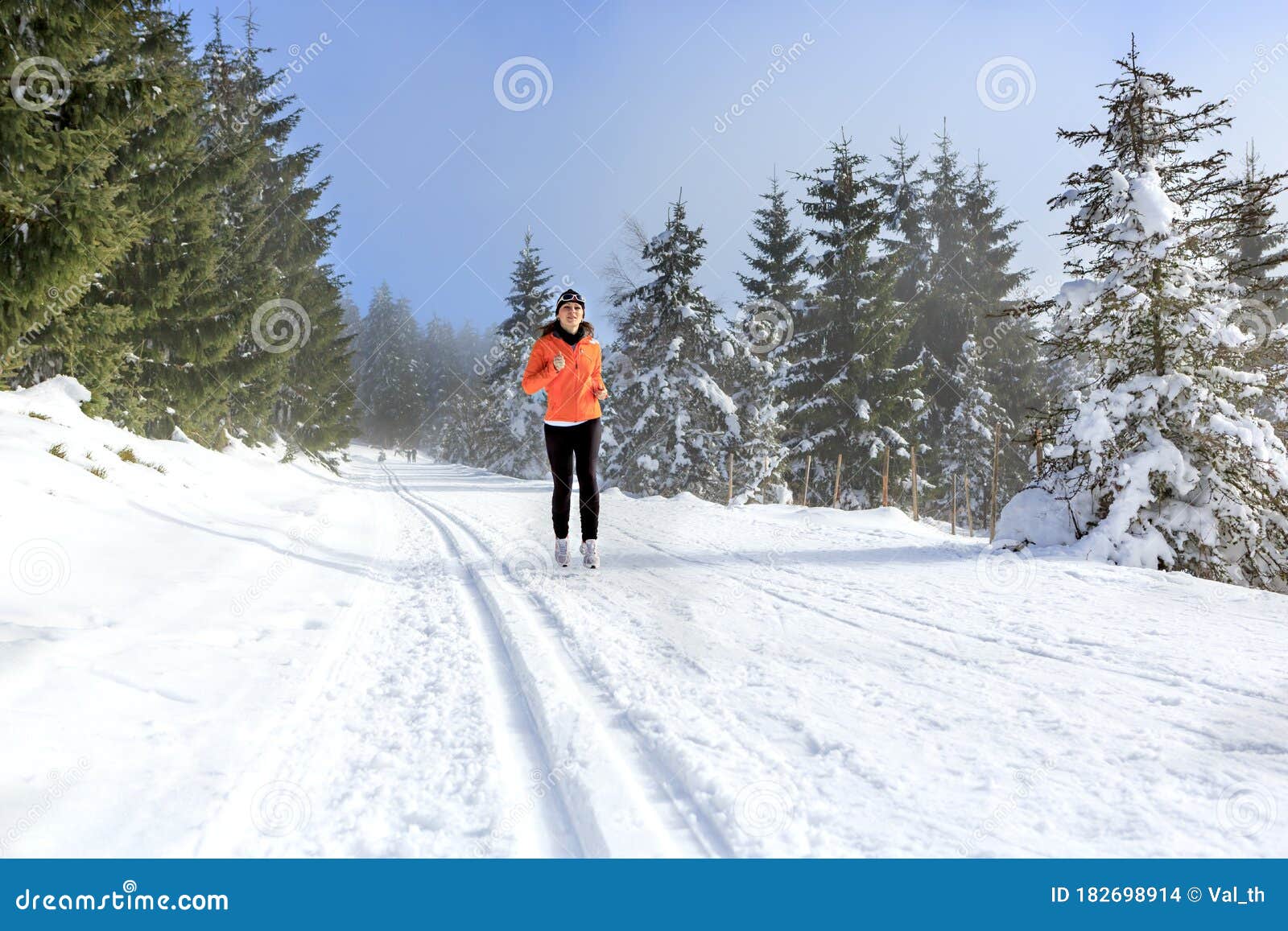 Winter jogging stock photo. Image of woman, activity - 182698914