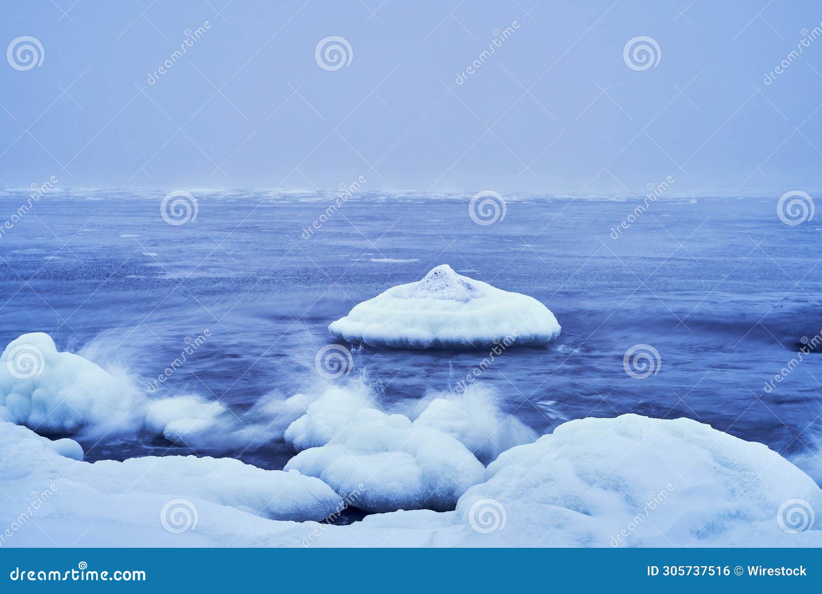 Winter Landscape Featuring Floating Ice and Sea Waves Stock Photo ...
