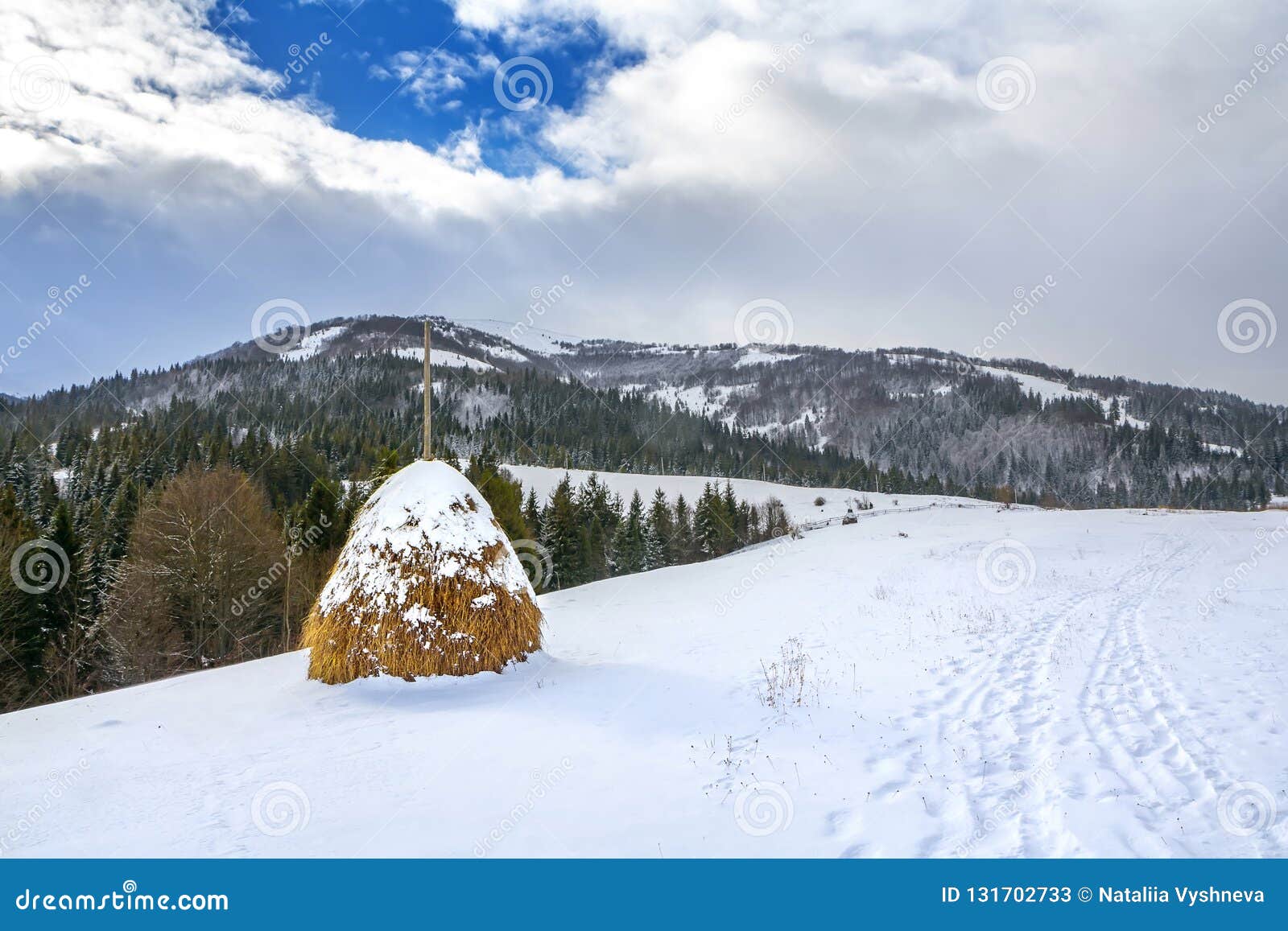 Winter Landscape with a Haystack on the Background of Snow-capped ...