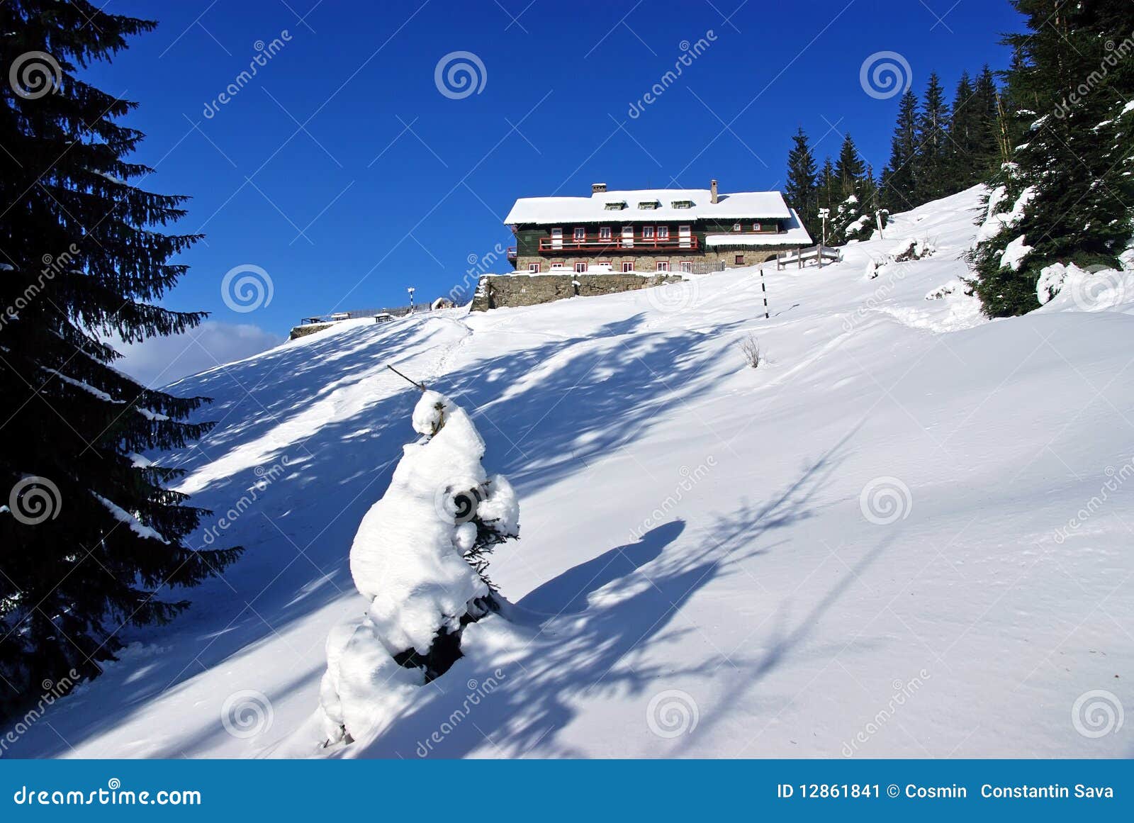 Winter at mountain chalet stock image. Image of chalets - 12861841